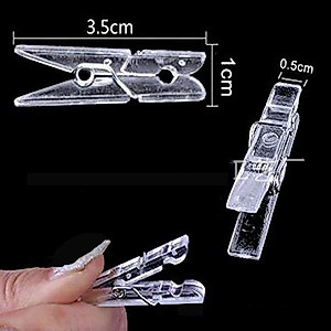 Yansanido 100pcs Mini Clear Plastic Utility Paper Clip, Clothespins Clips, Clothes Line String Clips, Mini Clothes Pins for Photo for String Fairy Lights Color Clear(100pcs Clear Plastic Clips)