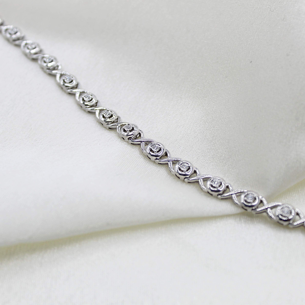 Fifth and Fine 1/6 Carat tw Natural Diamond XO Tennis Bracelet in 925 Sterling Silver
