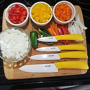 Serrated Black Ceramic Knife Set with 5" Serrated Knife. Includes 3”, 4”, 5”, 6” Ceramic Knives, Matching Sheaths and a Matching Vegetable Peeler in a Black Gift Box