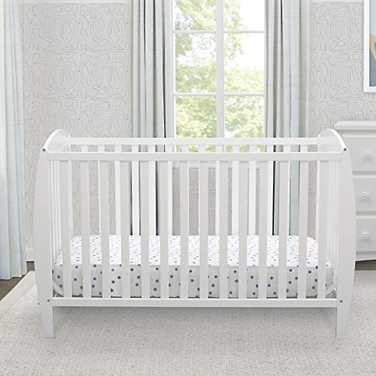 Delta Children Twinkle 4-in-1 Convertible Baby Crib, Sustainable New Zealand Wood, White and Delta Children Twinkle Galaxy Dual Sided Recycled Fiber Core Crib and Toddler Mattress (Bundle)