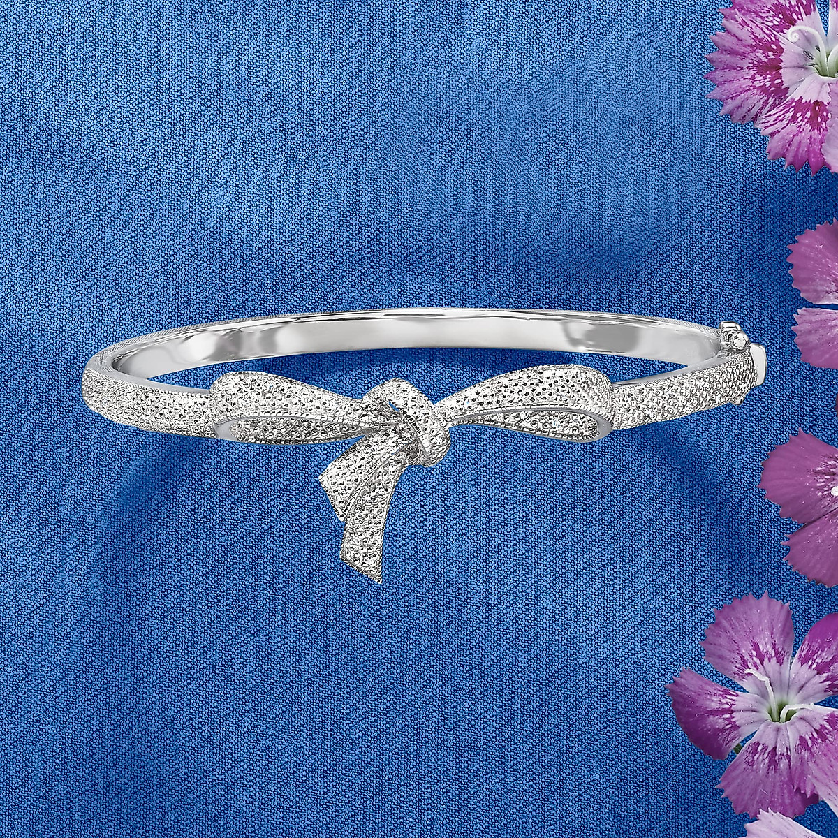 Ross-Simons 0.15 ct. t.w. Diamond Bow Bangle Bracelet in Sterling Silver. 8 inches