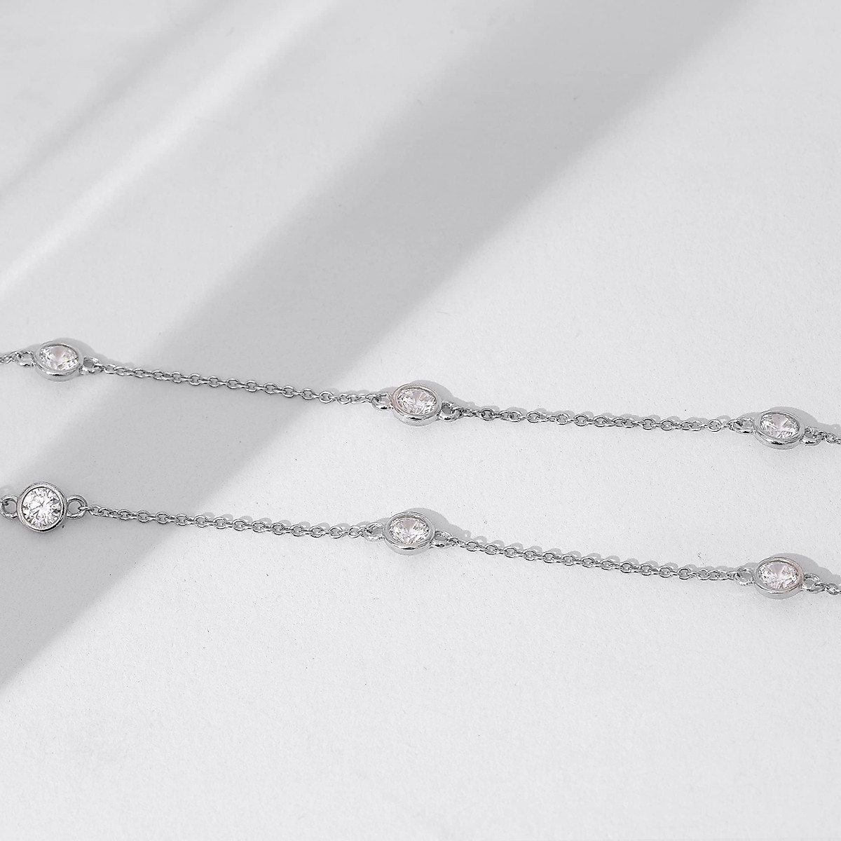 Amazon Essentials Platinum Plated Sterling Silver Station Necklace set with Infinite Elements Cubic Zirconia (4mm), 18" (previously Amazon Collection)