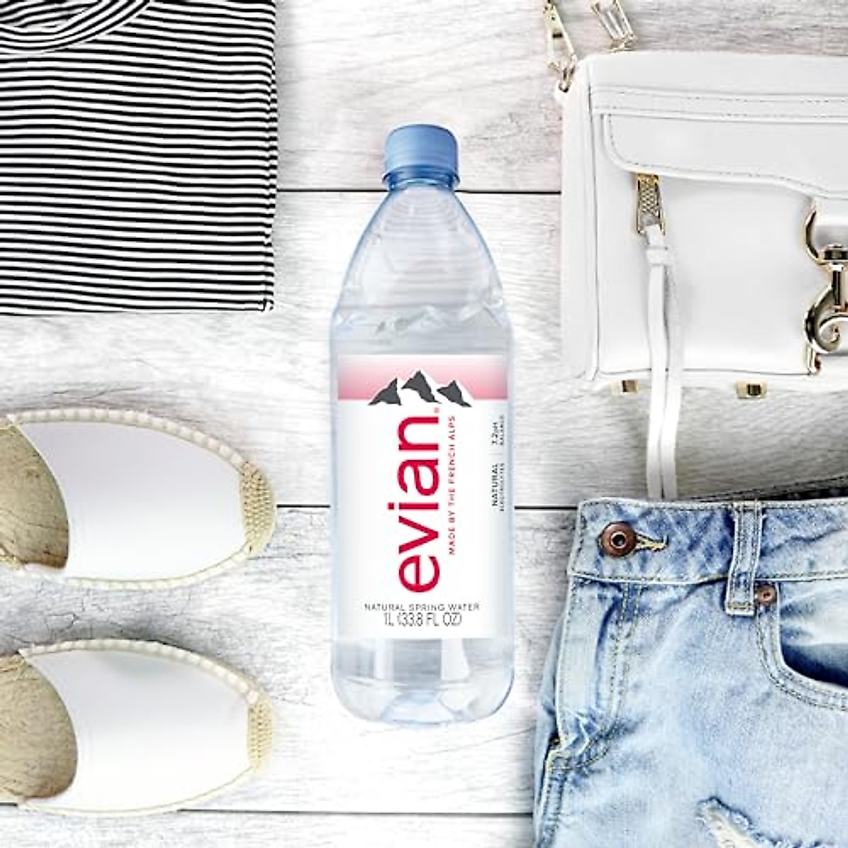 evian Natural Spring Water, PH Balanced with Natural Electrolytes, 33.8fl oz./1L Bottles (pack of 12)