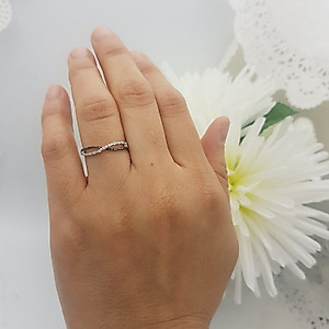 Dazzlingrock Collection 0.10 Carat (ctw) Round Black Diamond & White Diamond Swirl Infinity Style Wedding Band for Women in 925 Sterling Silver Size 10