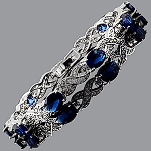 RIZILIA Tennis Bracelet & Oval Cut CZ [Simulated Blue Sapphire] in White Gold Plated, 7"