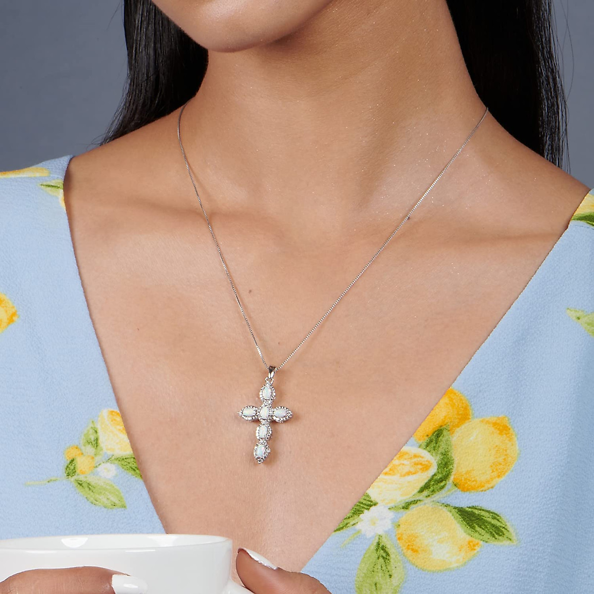 Jewelili Cross Pendant Necklace in Sterling Silver with Oval Shape Created Opal and Round Created White Sapphire, 18” Box Chain