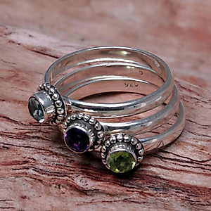 NOVICA Artisan Handmade Multigemstone Stacking Rings Sterling Silver Set of 3 Amethyst Blue Topaz Peridot Green Purple Multicolor Indonesia Modern Birthstone [crownbezel 0.2 in H x 0.2 in Diam. Band ]