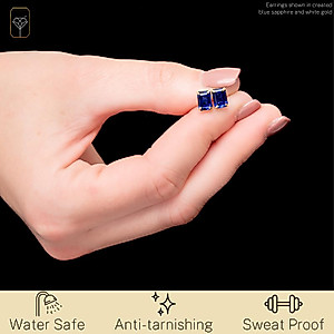 MAX + STONE 14k White Gold Solitaire Blue Aquamarine Emerald Cut Stud Earrings for Women | 7x5mm March Birthstone