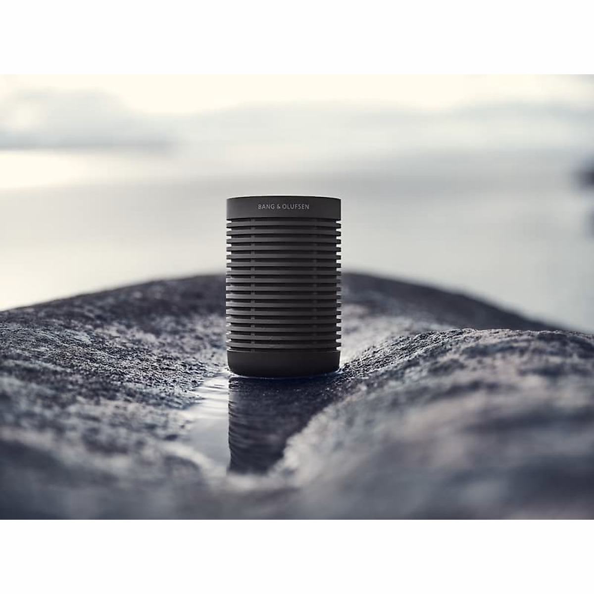 Bang & Olufsen Beosound Explore - Wireless Portable Outdoor Bluetooth Speaker, IP 67 Dustproof and Waterproof, Anthracite (Renewed Premium)