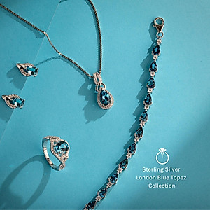 PEORA London Blue Topaz Cathedral Solitaire Ring for Women 925 Sterling Silver, Natural Gemstone Birthstone, 2.25 Carats Round Shape 8mm, Size 8