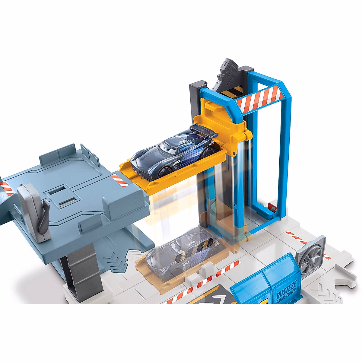 Disney Cars Toys Rust-Eze Tune-Up Center Toy Garage with Movie Themed Play Areas, Includes Jackson Storm Car, Transforming Feature, Elevator, Kids Birthday Race Gift Ages 4 and Older